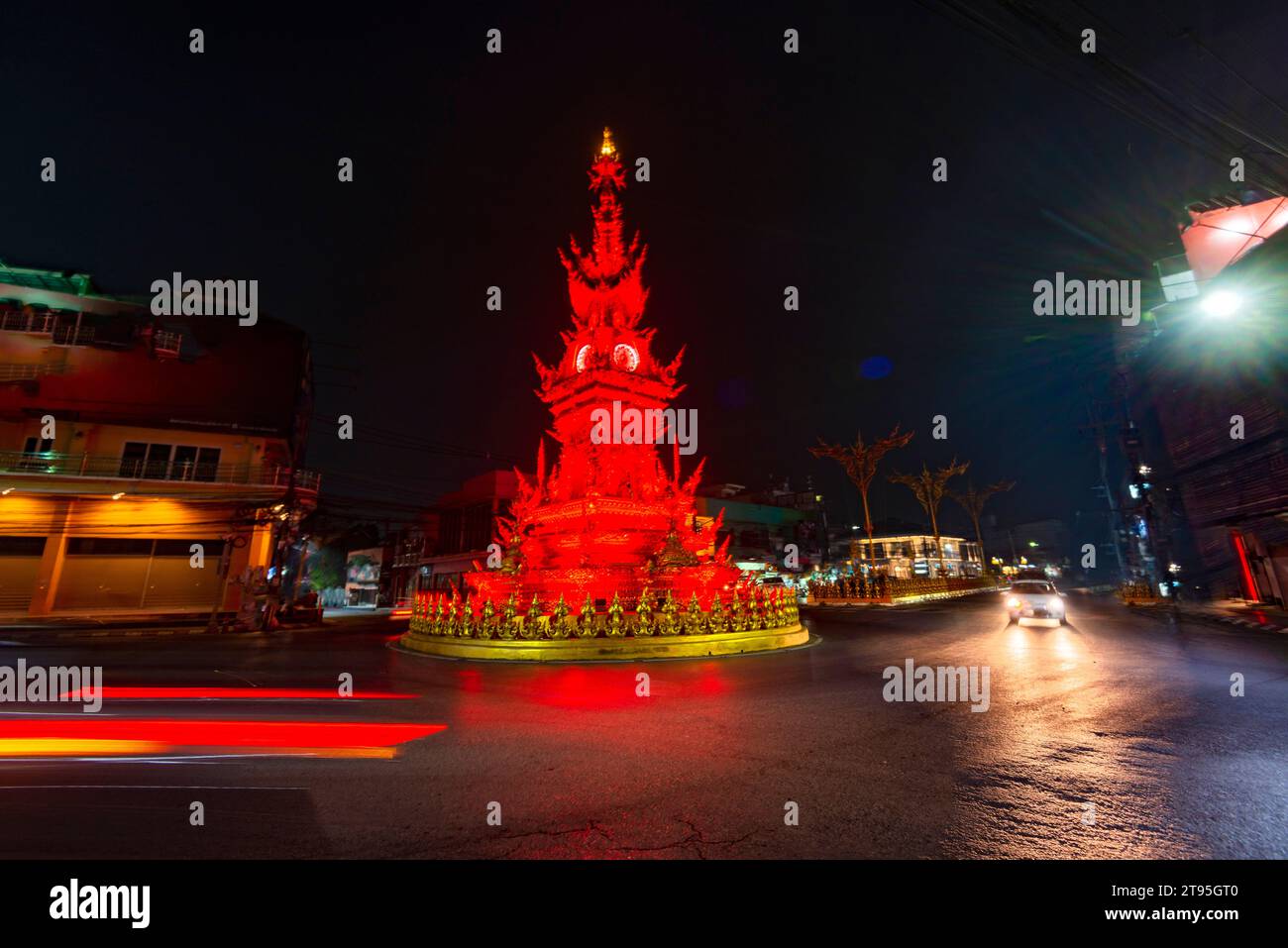 Changing hues,from colorful floodlights,light up the beautiful ornate ...