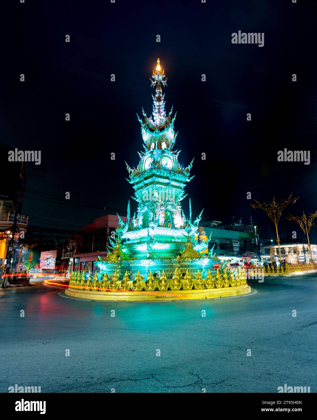 Changing hues,from colorful floodlights,light up the beautiful ornate ...
