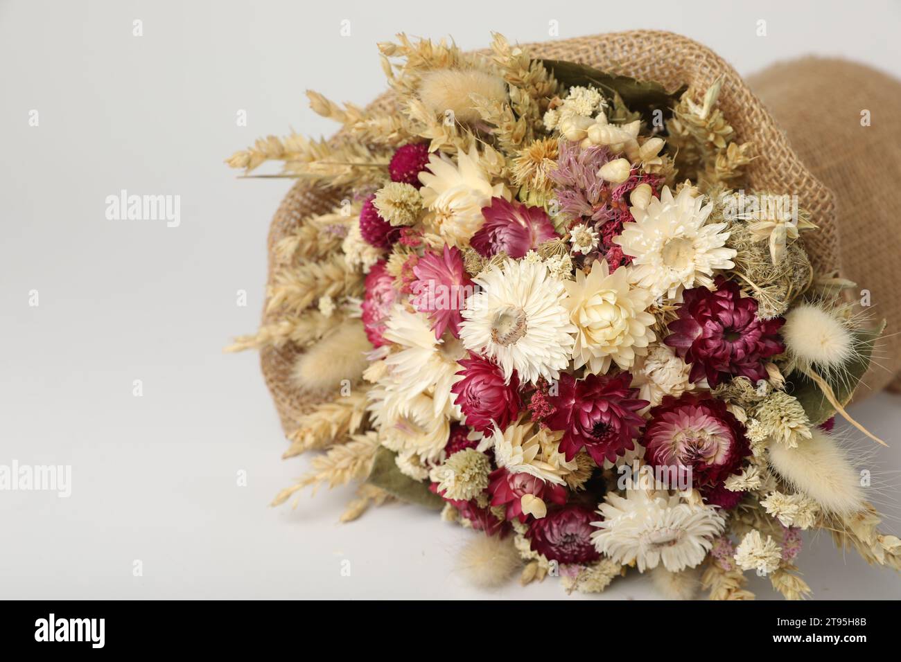 Beautiful bouquet of dry flowers on white background Stock Photo - Alamy