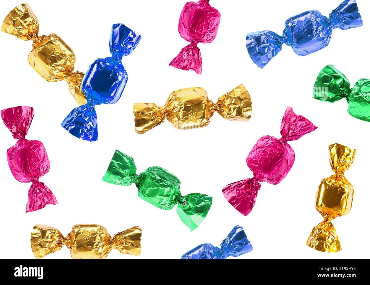 Tasty candies in bright wrappers falling on white background Stock ...