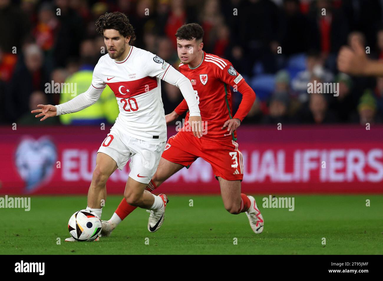 Cardiff, UK. 21st Nov, 2023. Ferdi Kadioglu of Turkey (20) and Neco ...