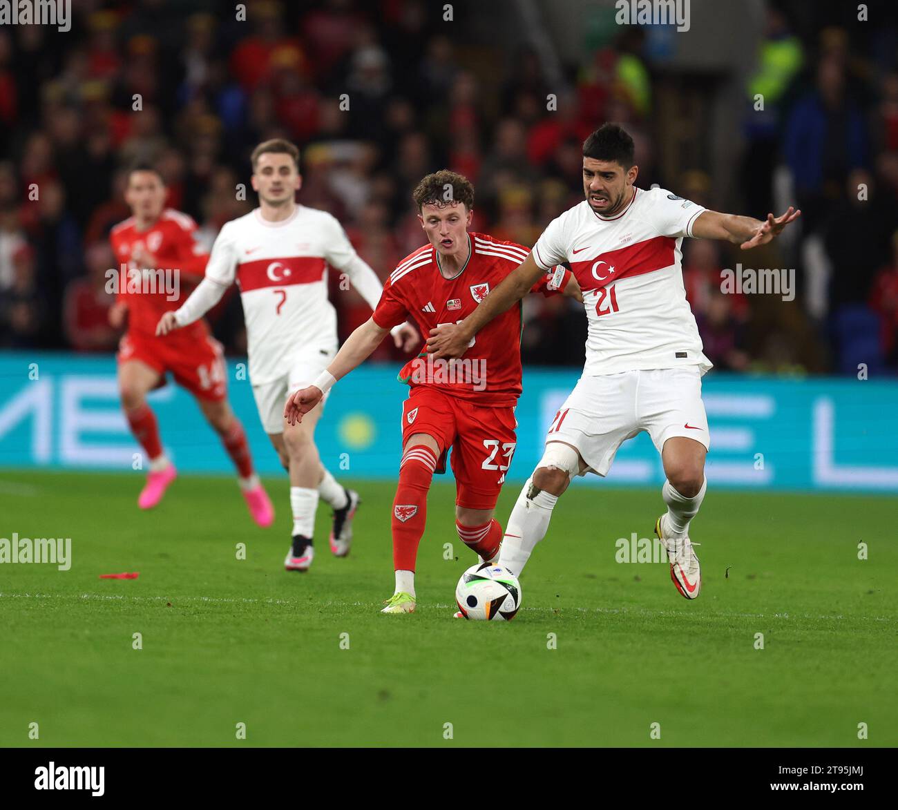 Cardiff, UK. 21st Nov, 2023. Cenk Ozkacar of Turkey (21) and Nathan ...