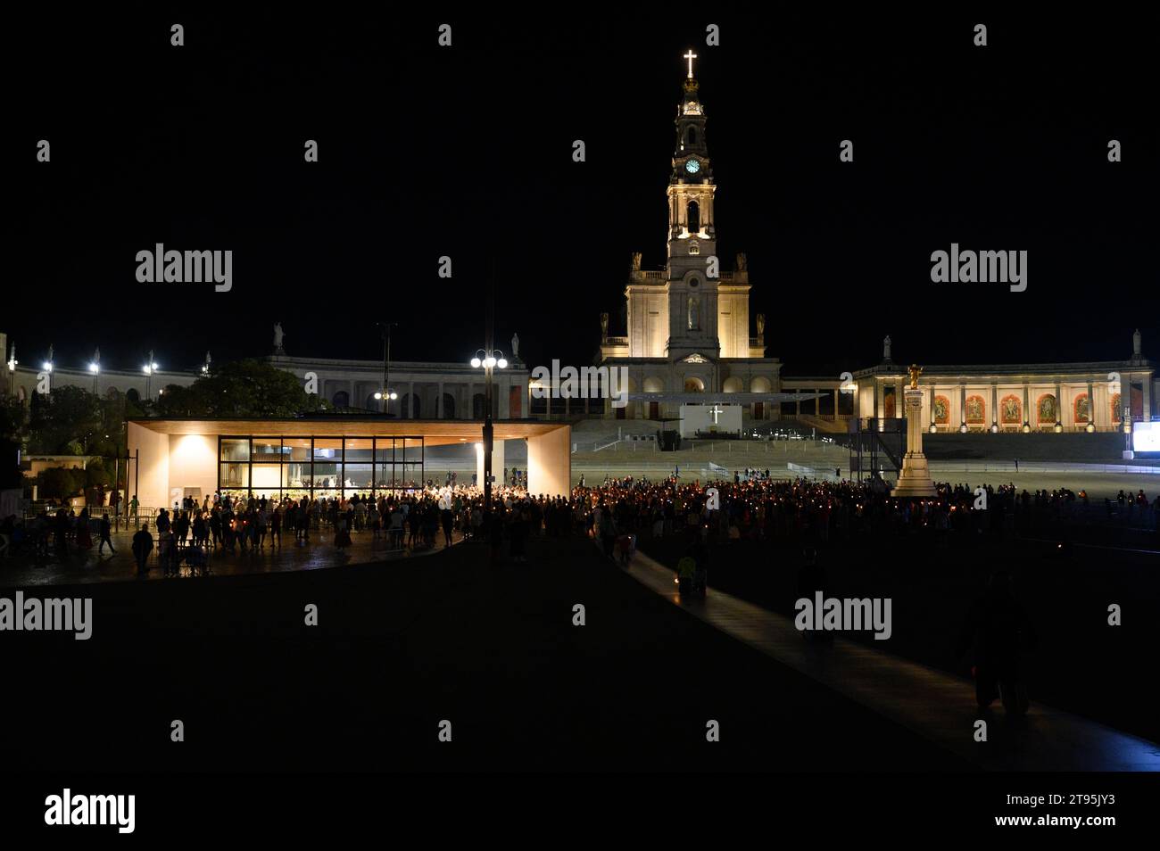 The evening candlelight prayer of the rosary around the Chapel of the Apparitions. Sanctuary of ...