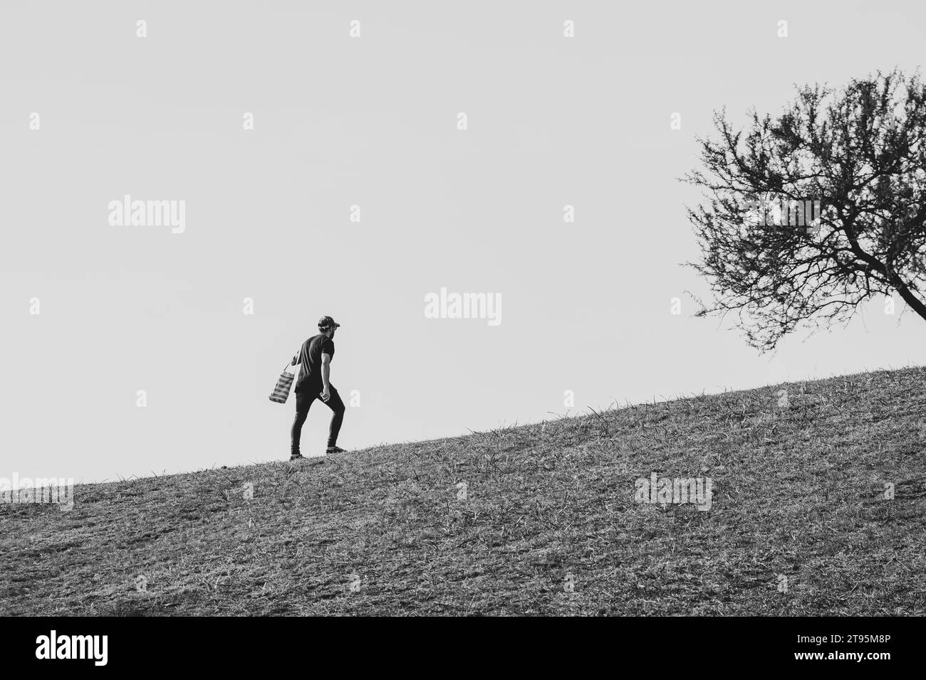 Walking up a mountain Black and White Stock Photos & Images - Alamy