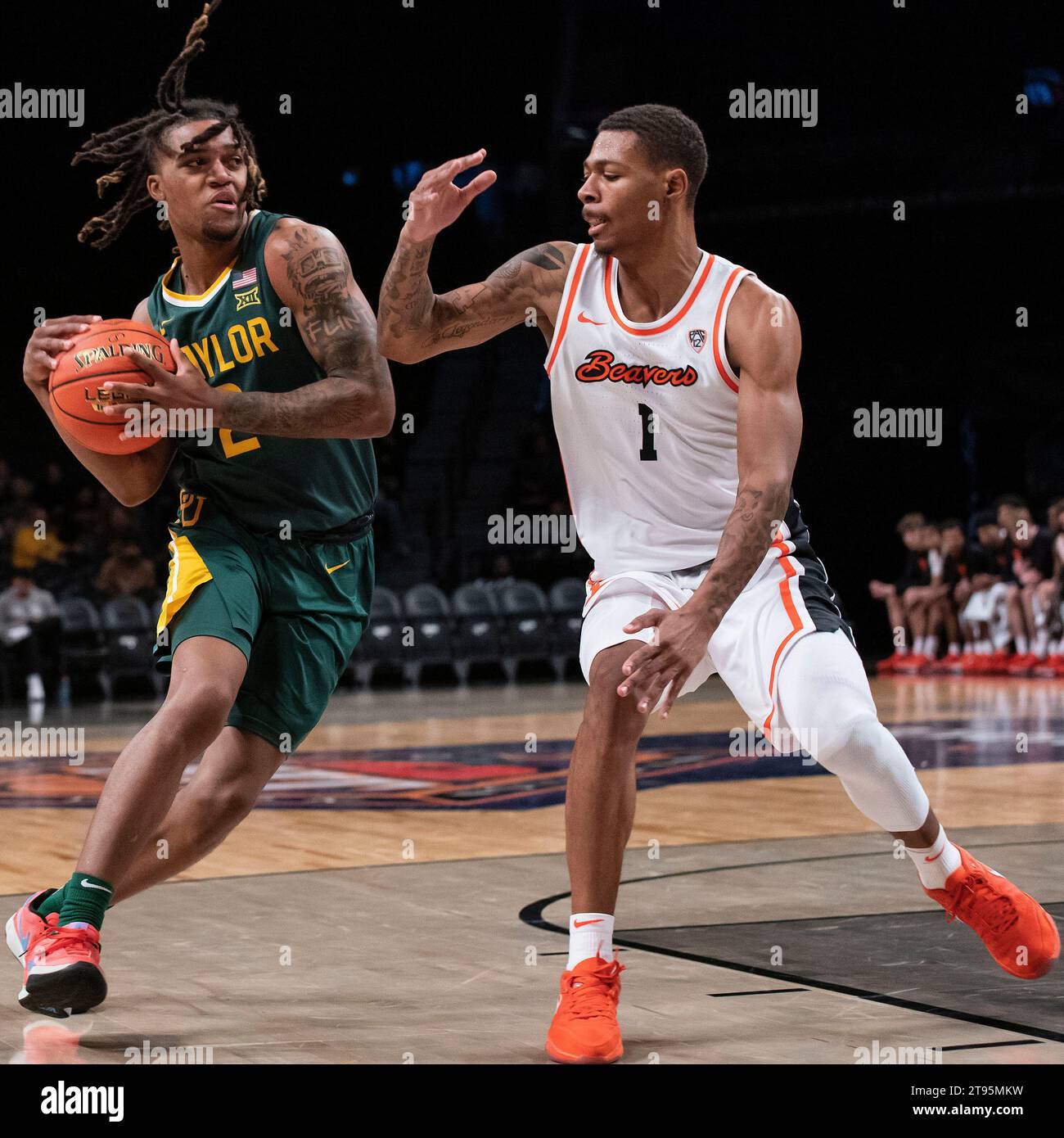 Baylor guard Jayden Nunn (2) drives to the basket against Oregon State guard Christian Wright (1 ...