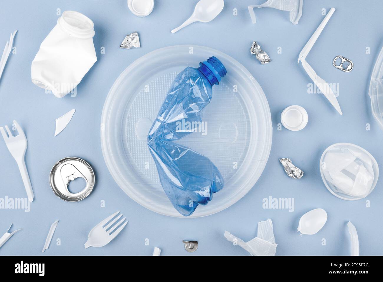 Plastic waste collection on blue background. Concept of Recycling ...