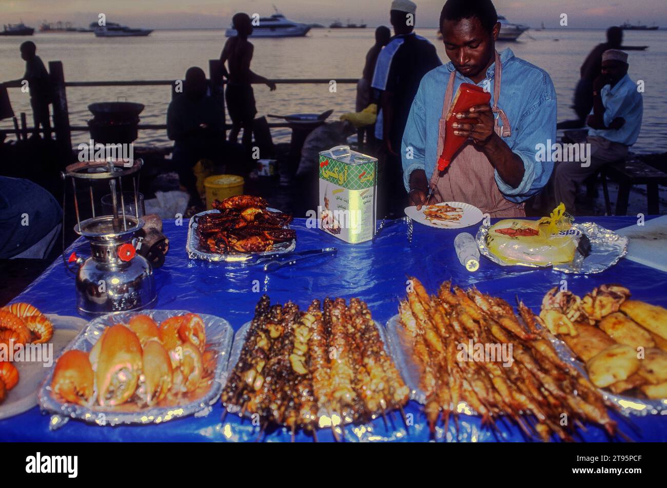 Stone Town, Zanzibar, Tanzania. Night market food vendor at Forodhani ...