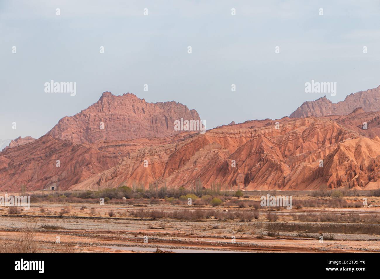 Underground red rocks exposed to the surface due to tectonic movements ...