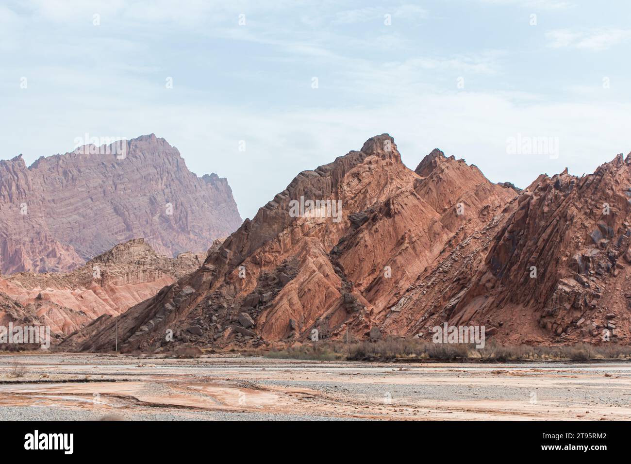 Underground red rocks exposed to the surface due to tectonic movements ...