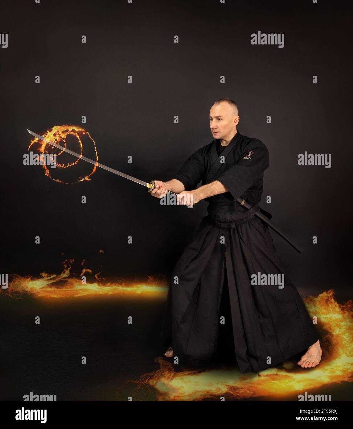 Portrait of aikido sensei master with black sensei belt in taekwondo ...