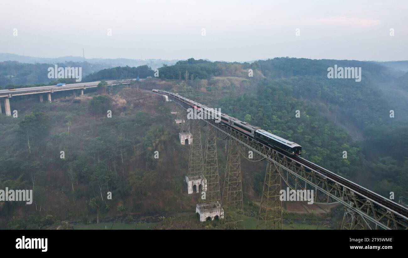 Scenic View of a Passenger Train Passing by Cikubang Bridge Longest ...