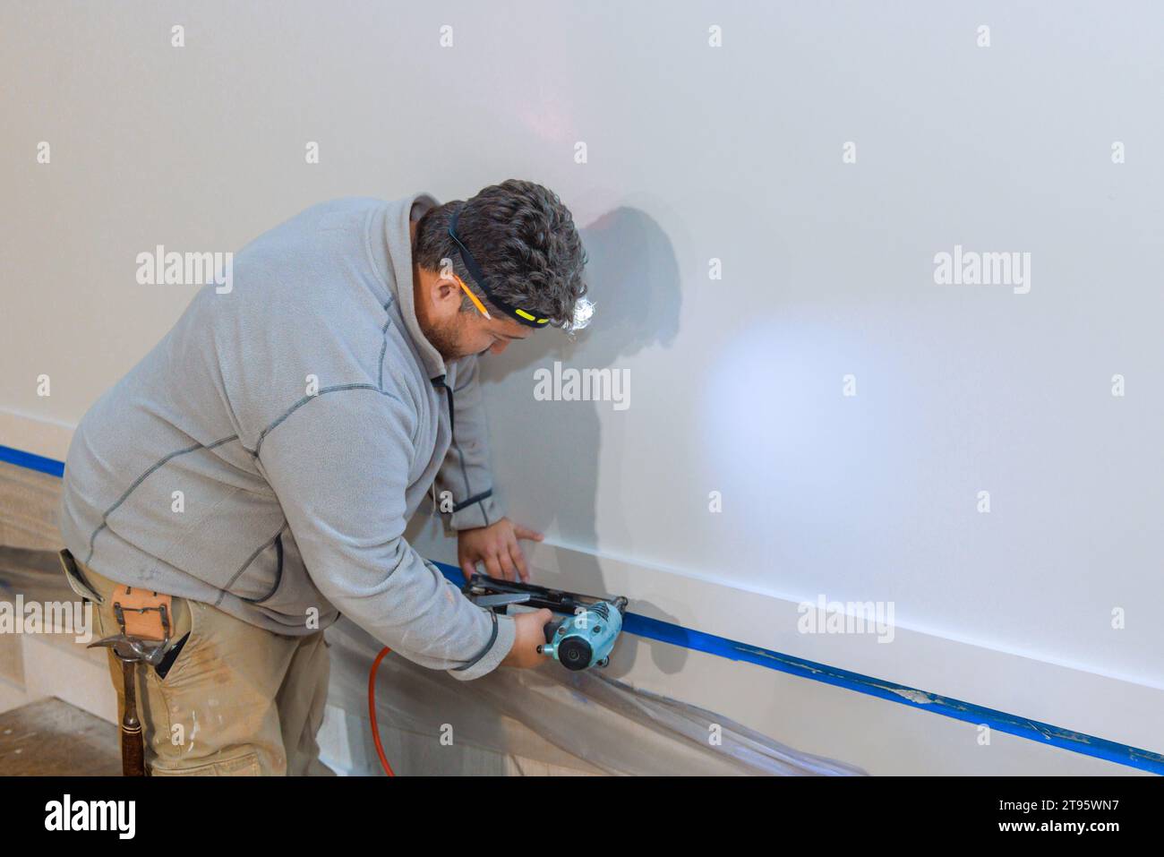 An air gun was used by contractor during installation of wooden trim ...