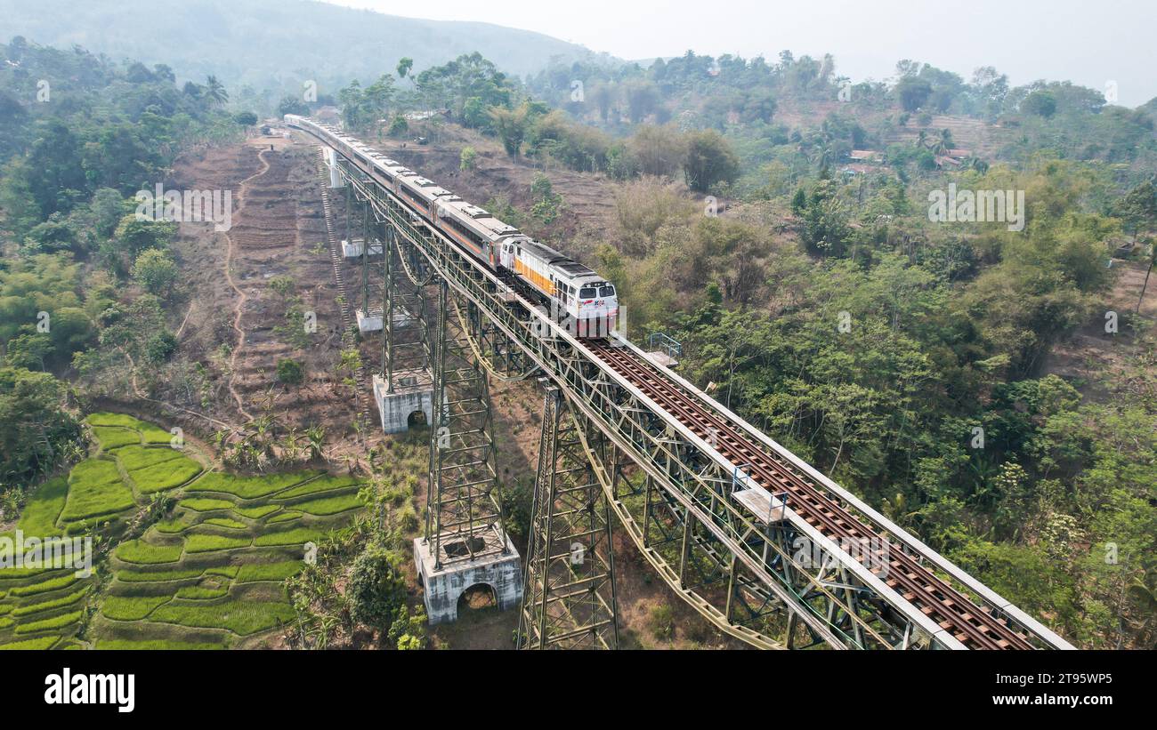 Scenic View of a Passenger Train Passing by Cikubang Bridge Longest ...