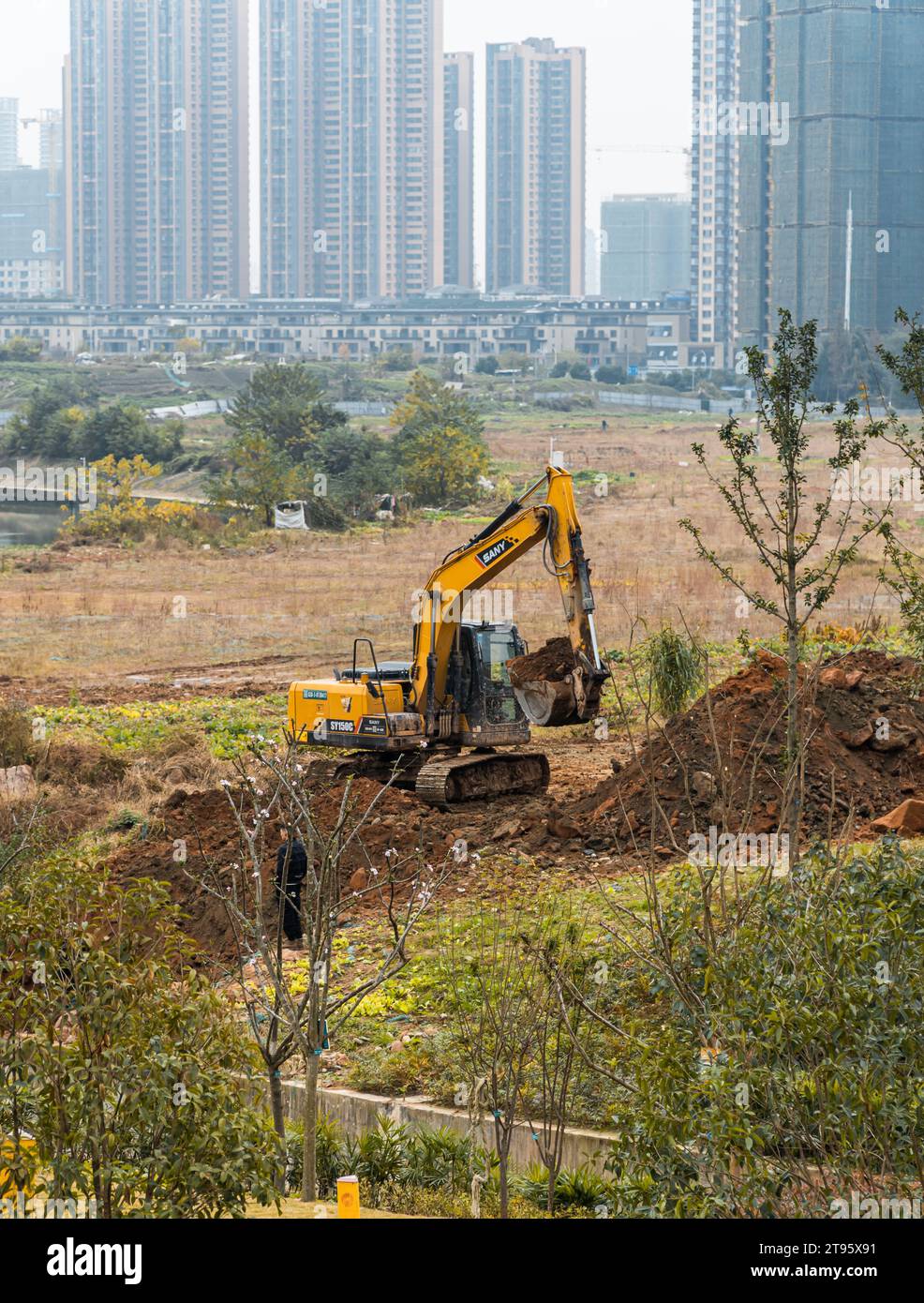 Excavators under construction on the construction site Stock Photo - Alamy