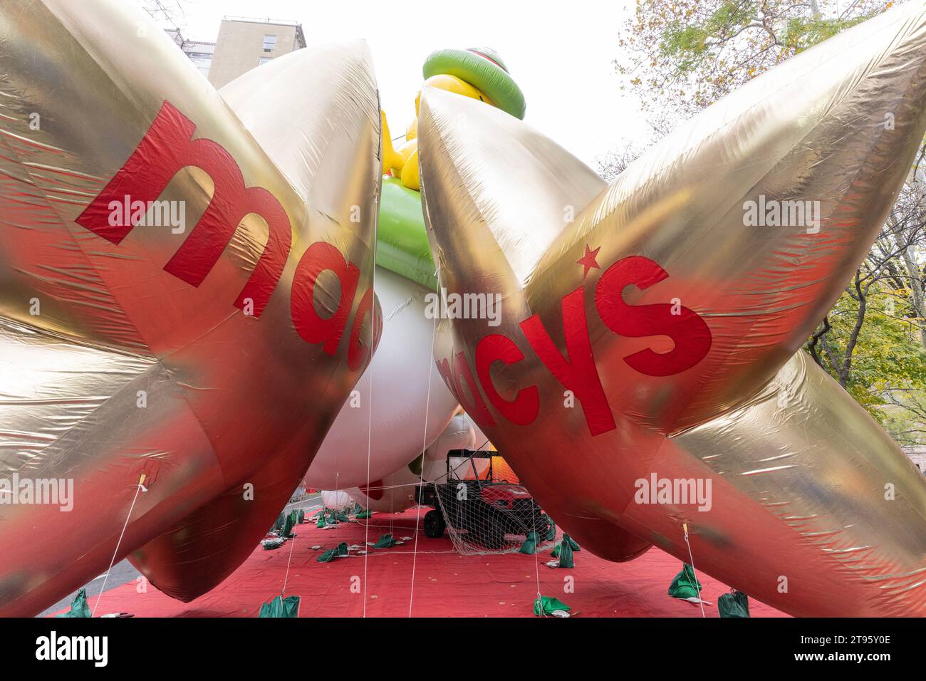 Members of the Macy's inflation team work on giant balloons as they ...