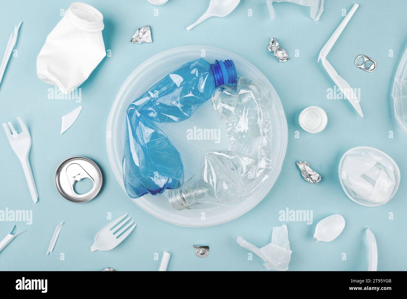 Plastic waste collection on blue background. Concept of Recycling ...