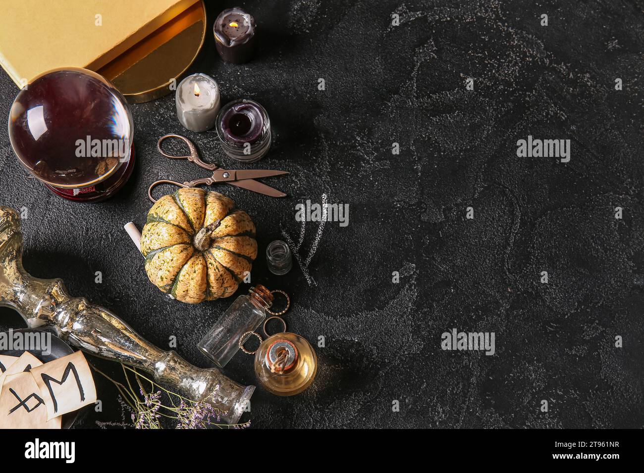 Magic attributes burning candles hi-res stock photography and images ...