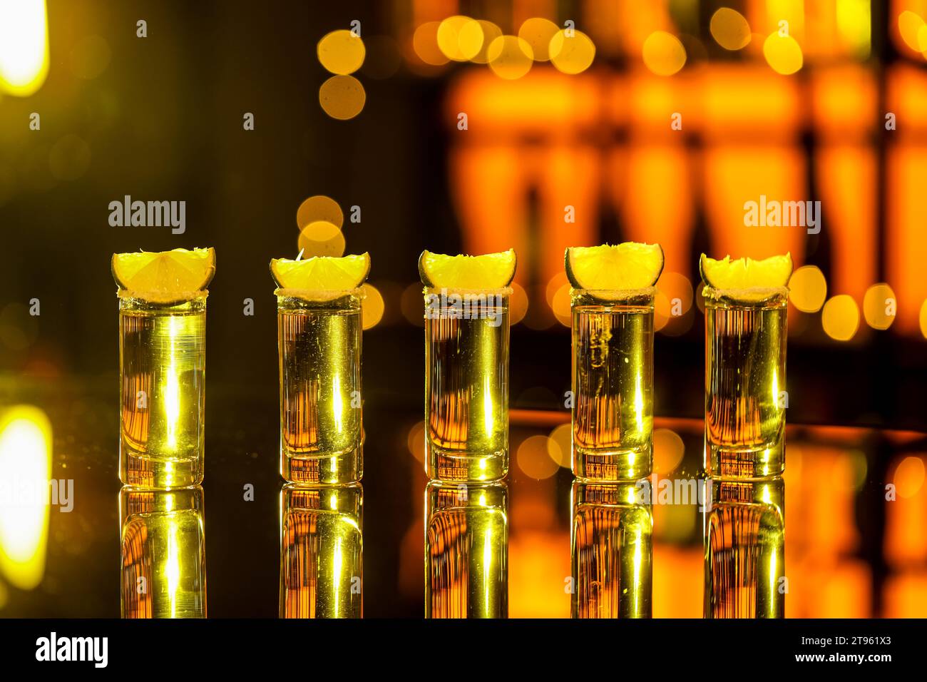 Tequila shots on table in bar Stock Photo - Alamy