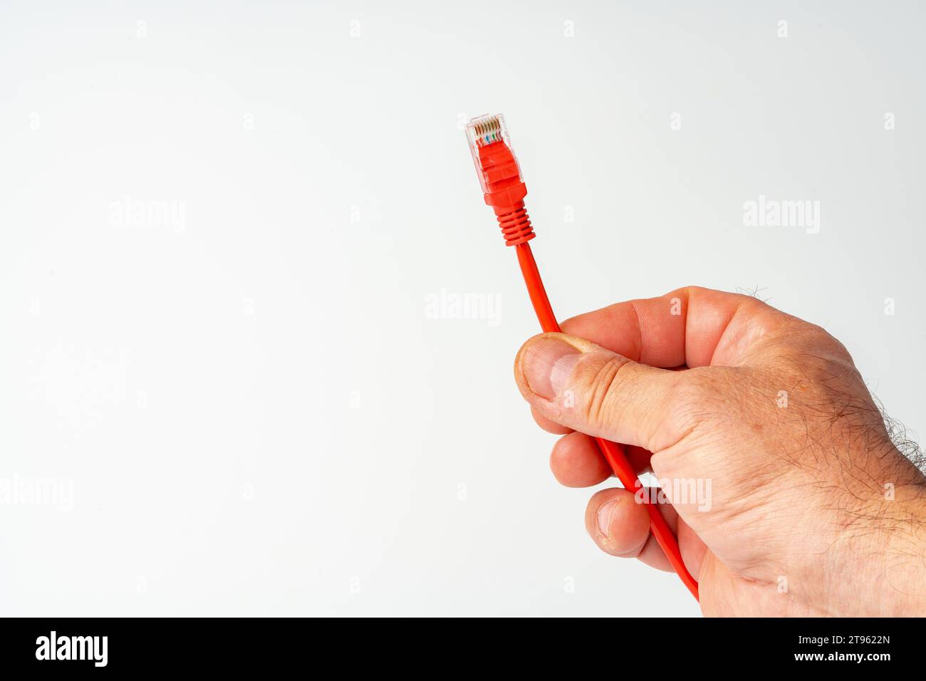 Hand holding lan cable router hi-res stock photography and images - Alamy