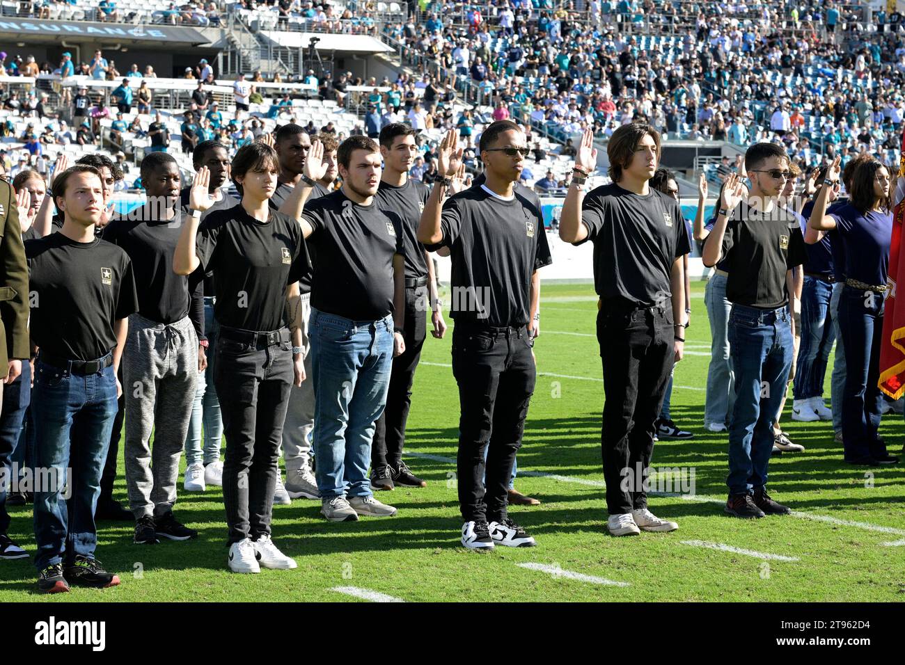 U.S. Military recruits participate in a swearing-in ceremony on the ...