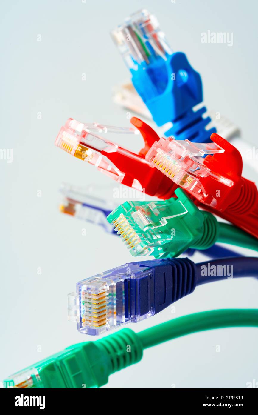 Colorful network cables switch on white background Stock Photo - Alamy