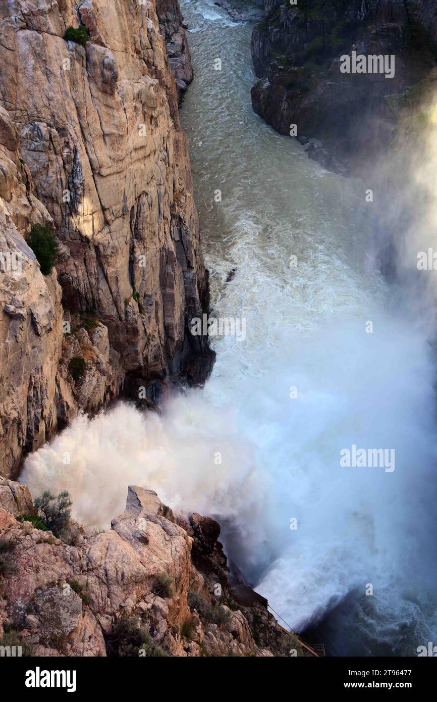 the turbulent water of the shoshone river flowing over the buffalo bill ...