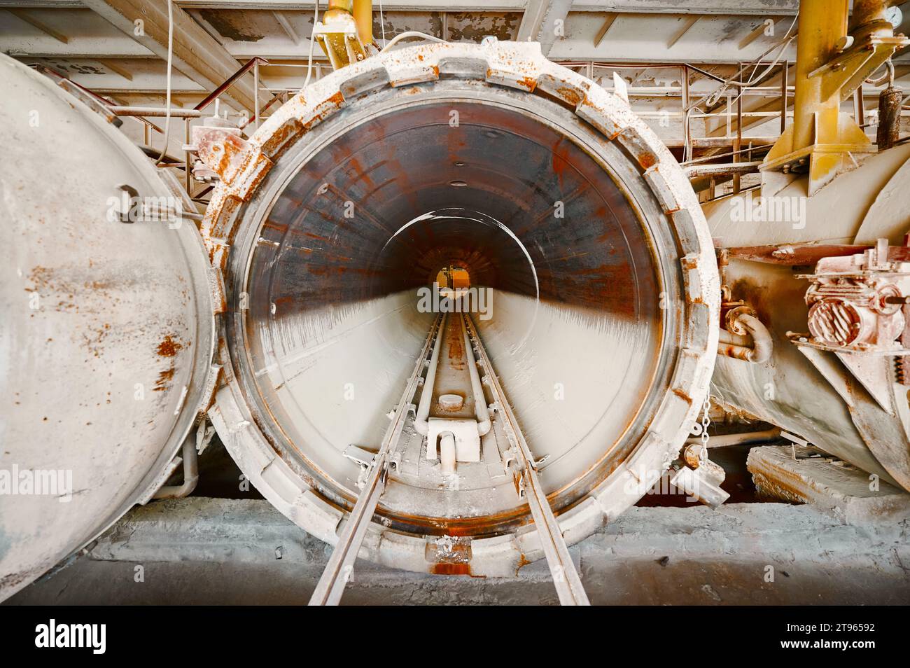 Open empty digestion tanks hardening in plant workshop Stock Photo - Alamy