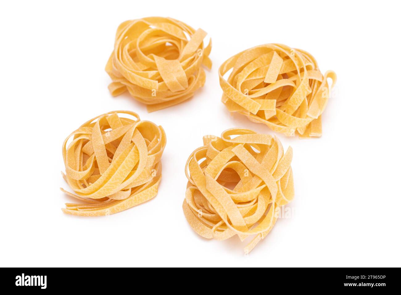 Four Classic Italian Raw Egg Fettuccine - Isolated on White Background ...