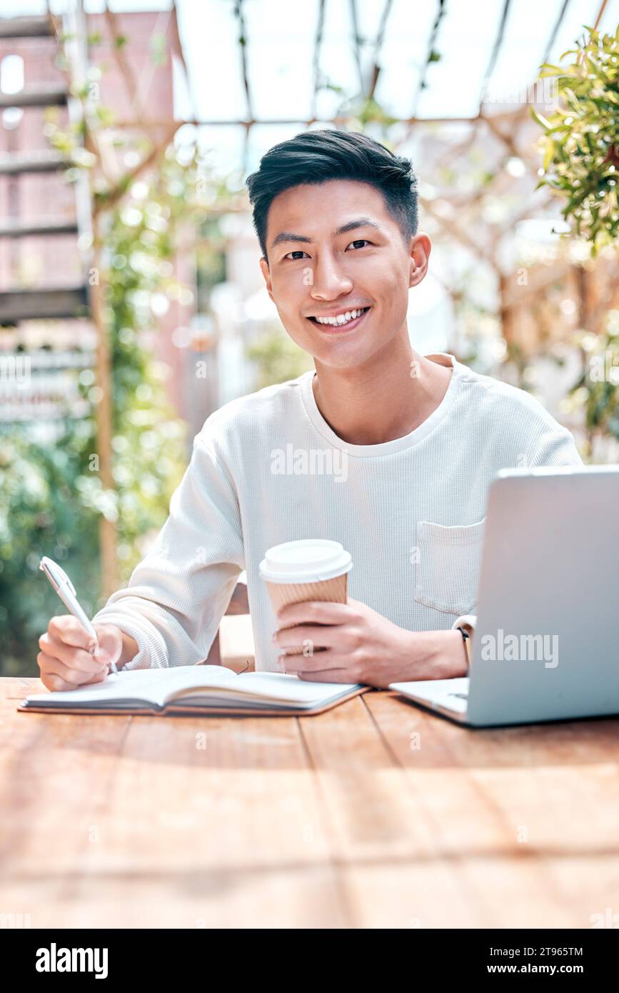 Man, writing and smile in cafe, notebook and planning for future, ideas ...