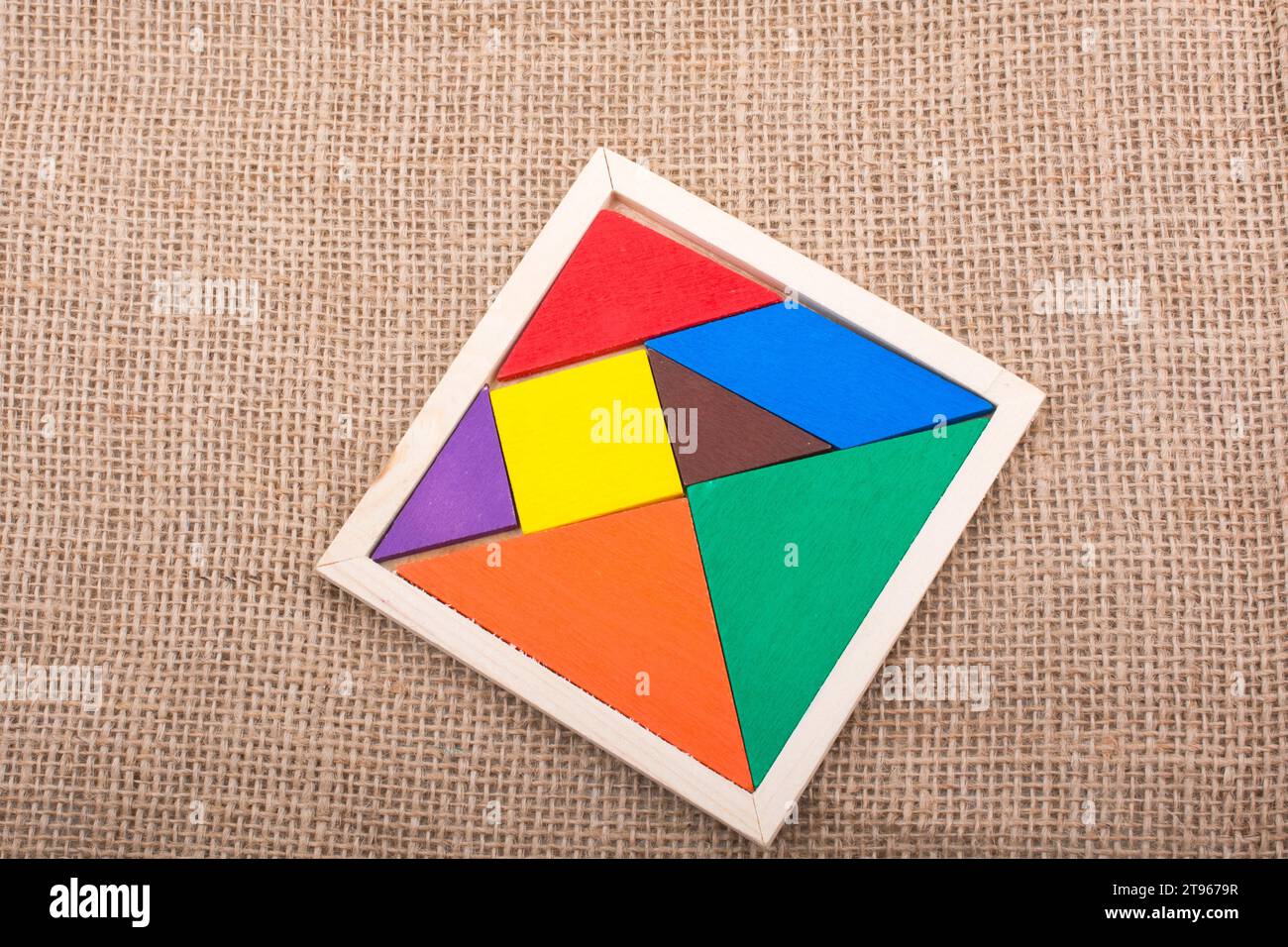 Colorful pieces of a square tangram puzzle Stock Photo - Alamy
