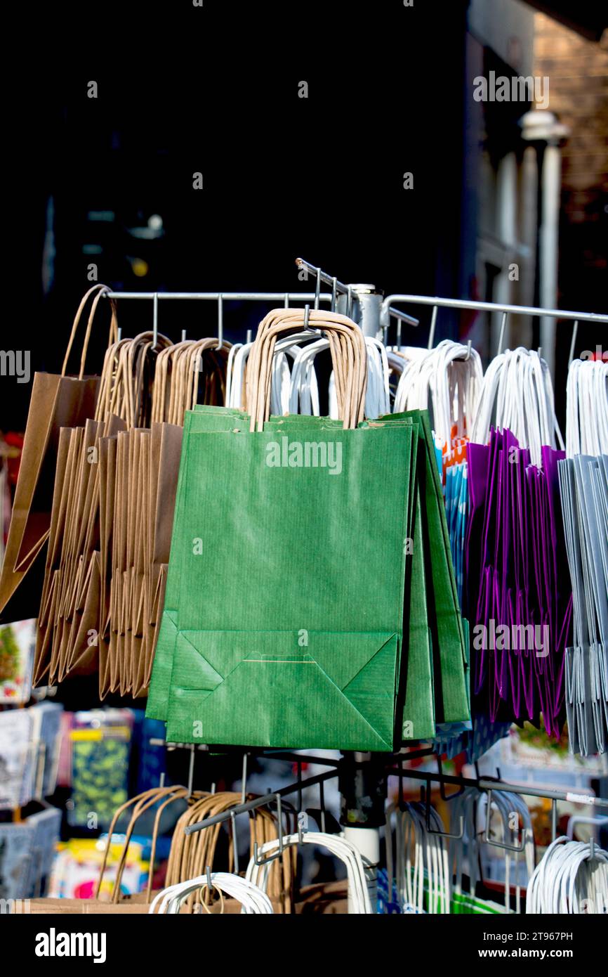 One simple color paper shopping bag in the market place Stock Photo - Alamy