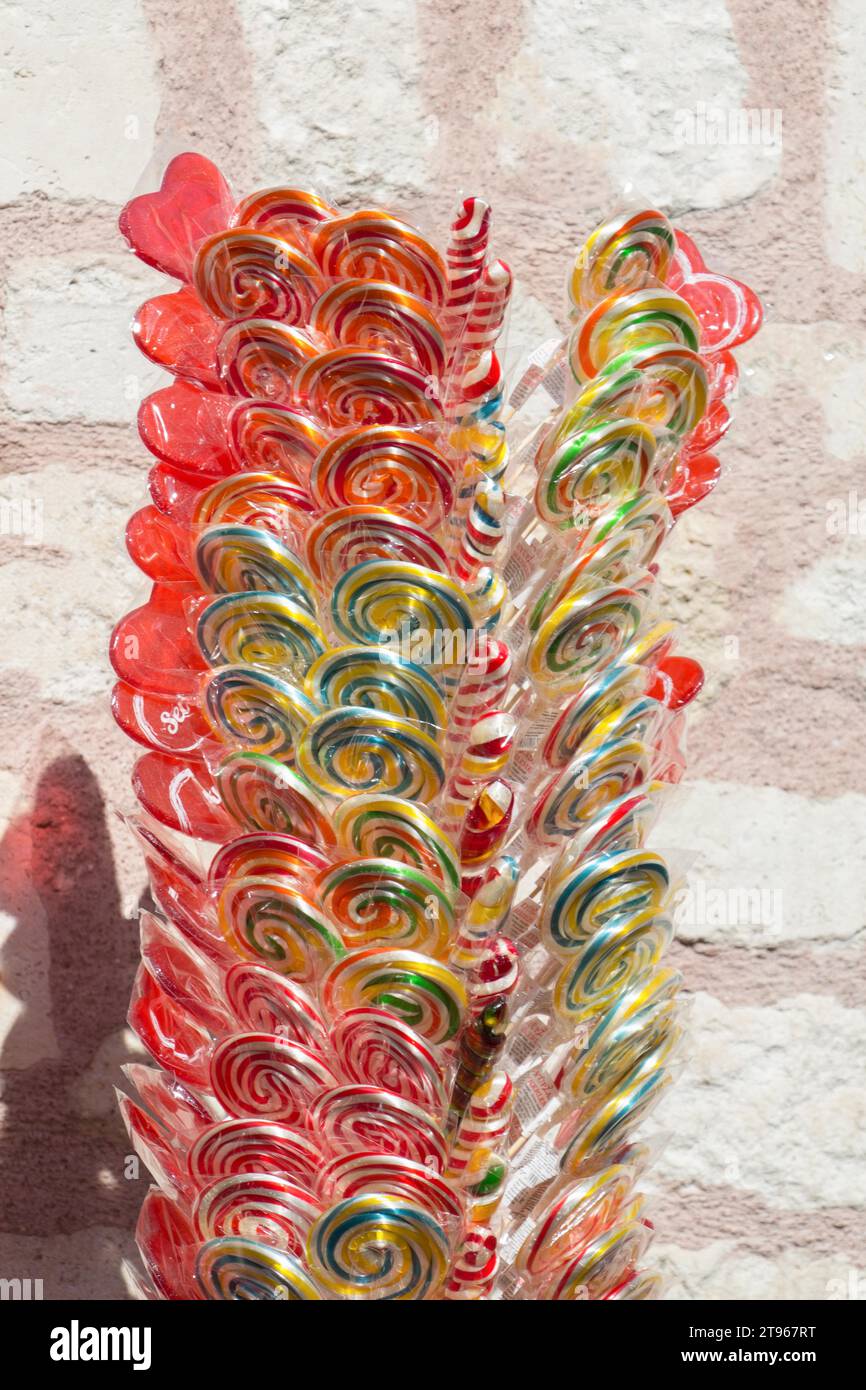 Delicious colorful swirl candy and sweets for kids Stock Photo - Alamy