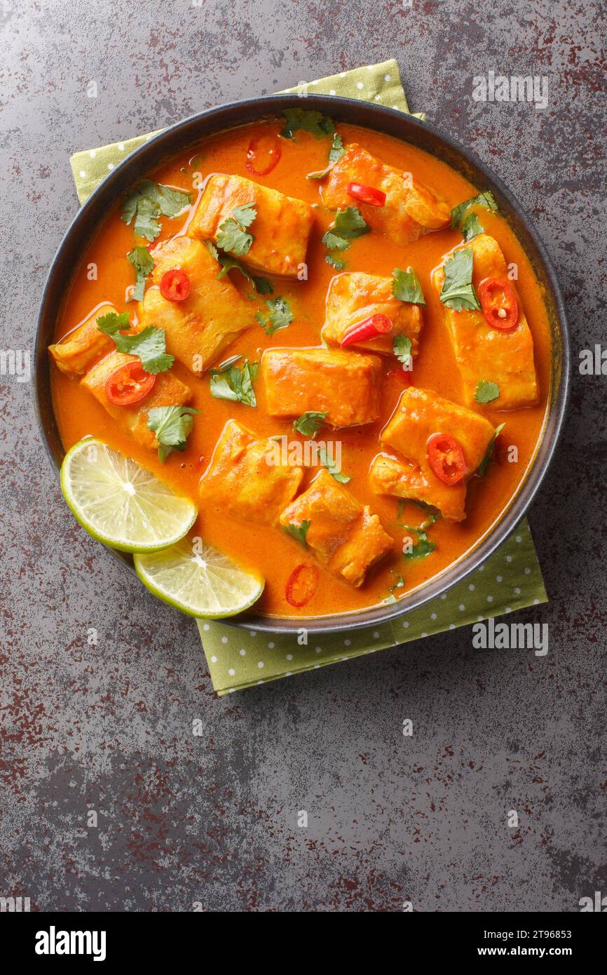 Fragrant fish curry of white fish fillet with coconut, tomatoes and ...