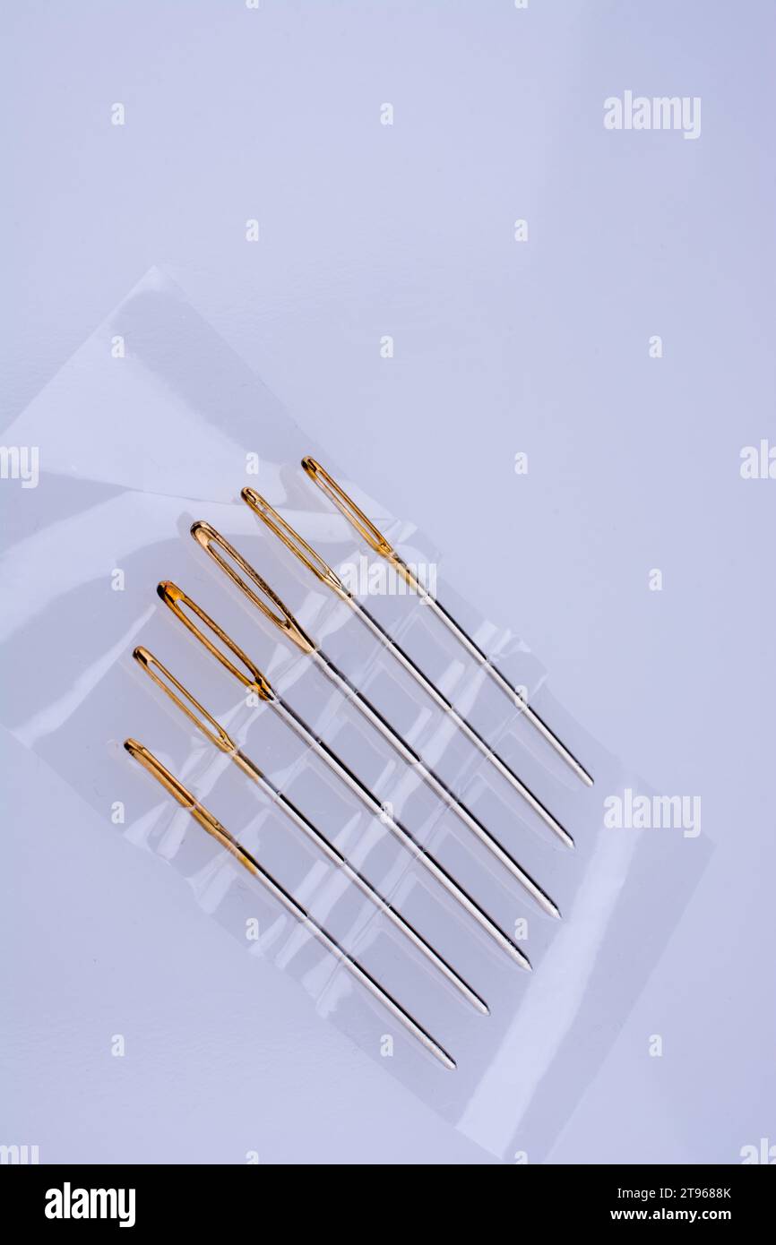 Six different sewing needles isolated on a white background Stock Photo ...