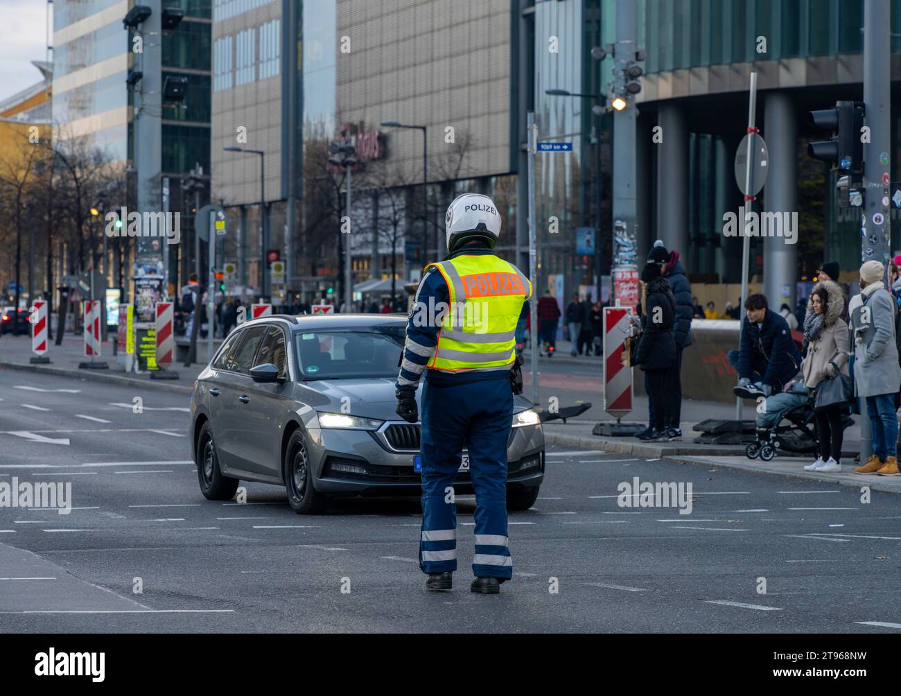 Special operation at Potsdamer Platz, traffic control by police officers of the motorised ...