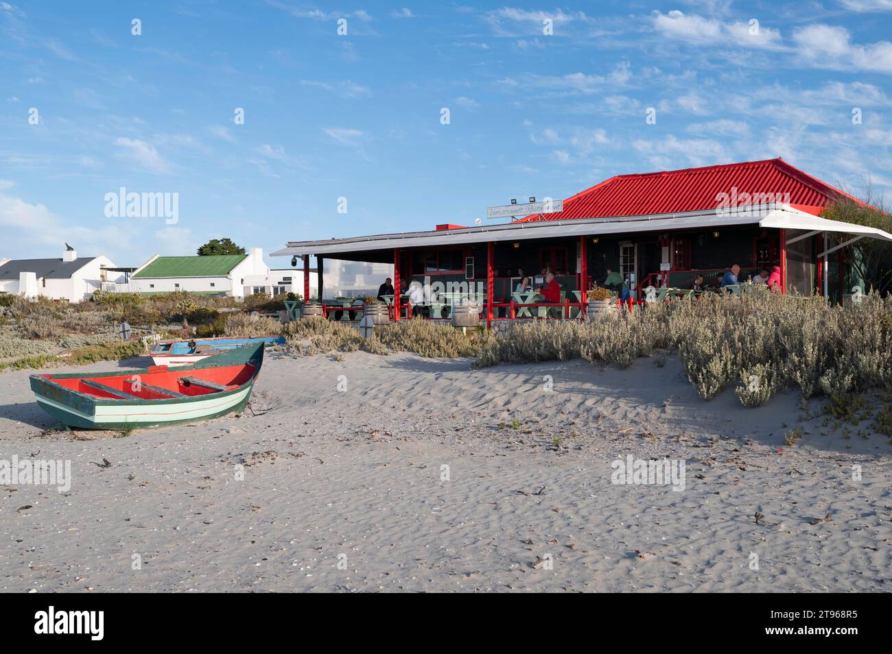 Fishing boat in front of beach restaurant, paternoster on the Atlantic ...