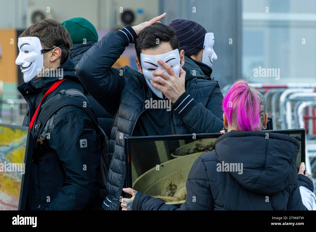 Demonstration against animal testing, participants with Guy Fawkes mask ...