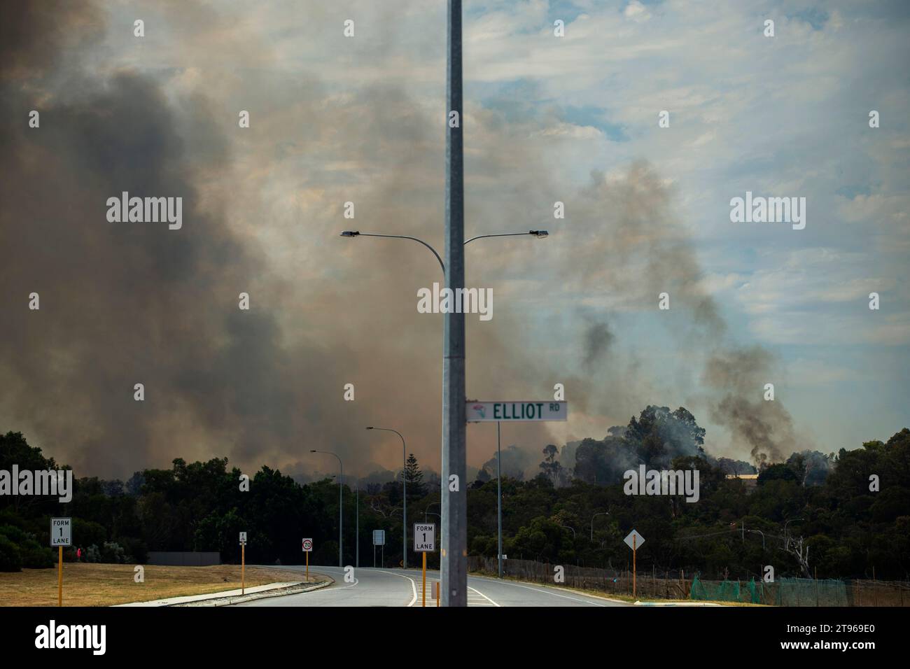 Perth, Australia. 23rd Nov, 2023. Smoke is seen as firefighters attempt ...