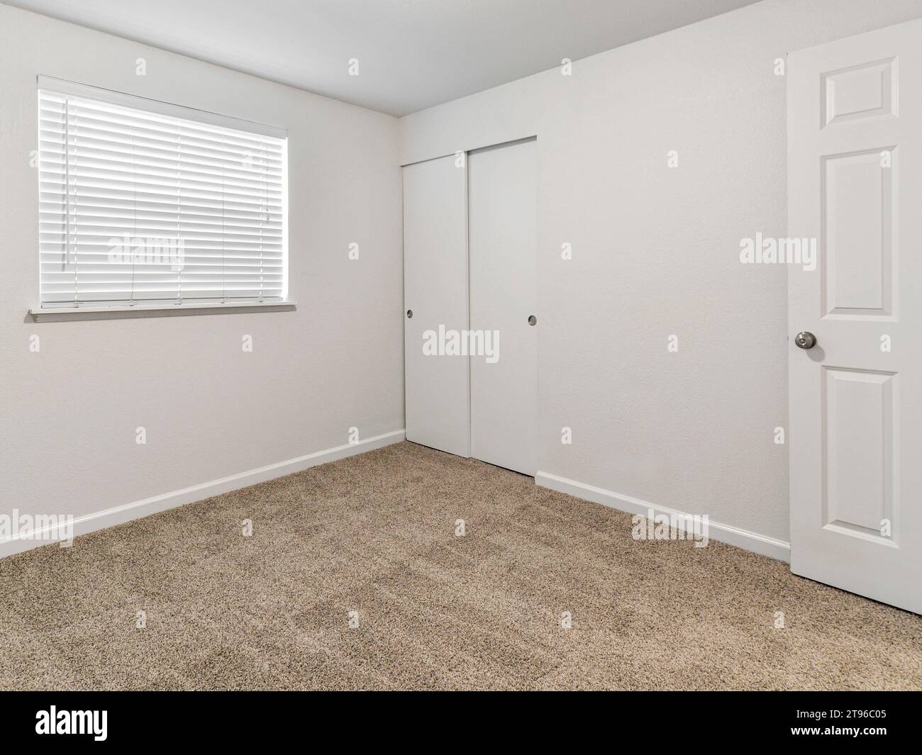 Modern residential empty bedroom interior Stock Photo - Alamy