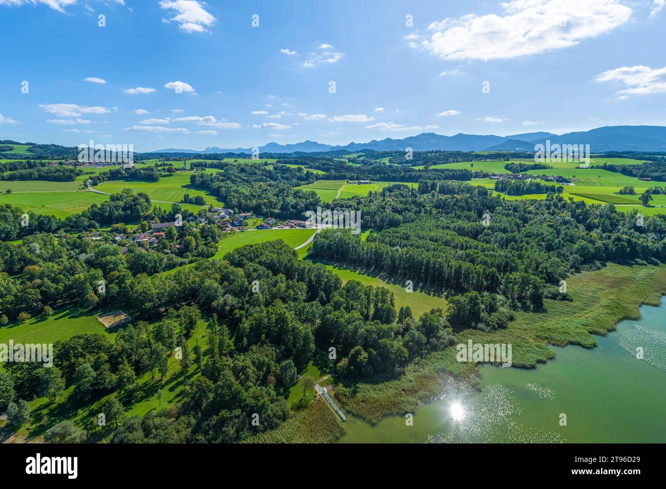 Aerial view to the Chiemgau region around the Simssee near Riedering ...