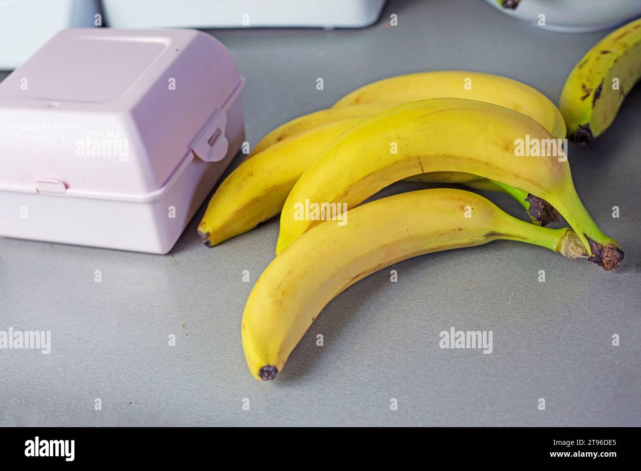 banana and a row of small containers with a snack. Back to school Stock ...