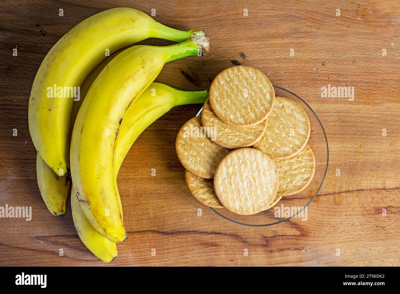 bunch of banana next to banana cookies. make banana cookies. Taking ...