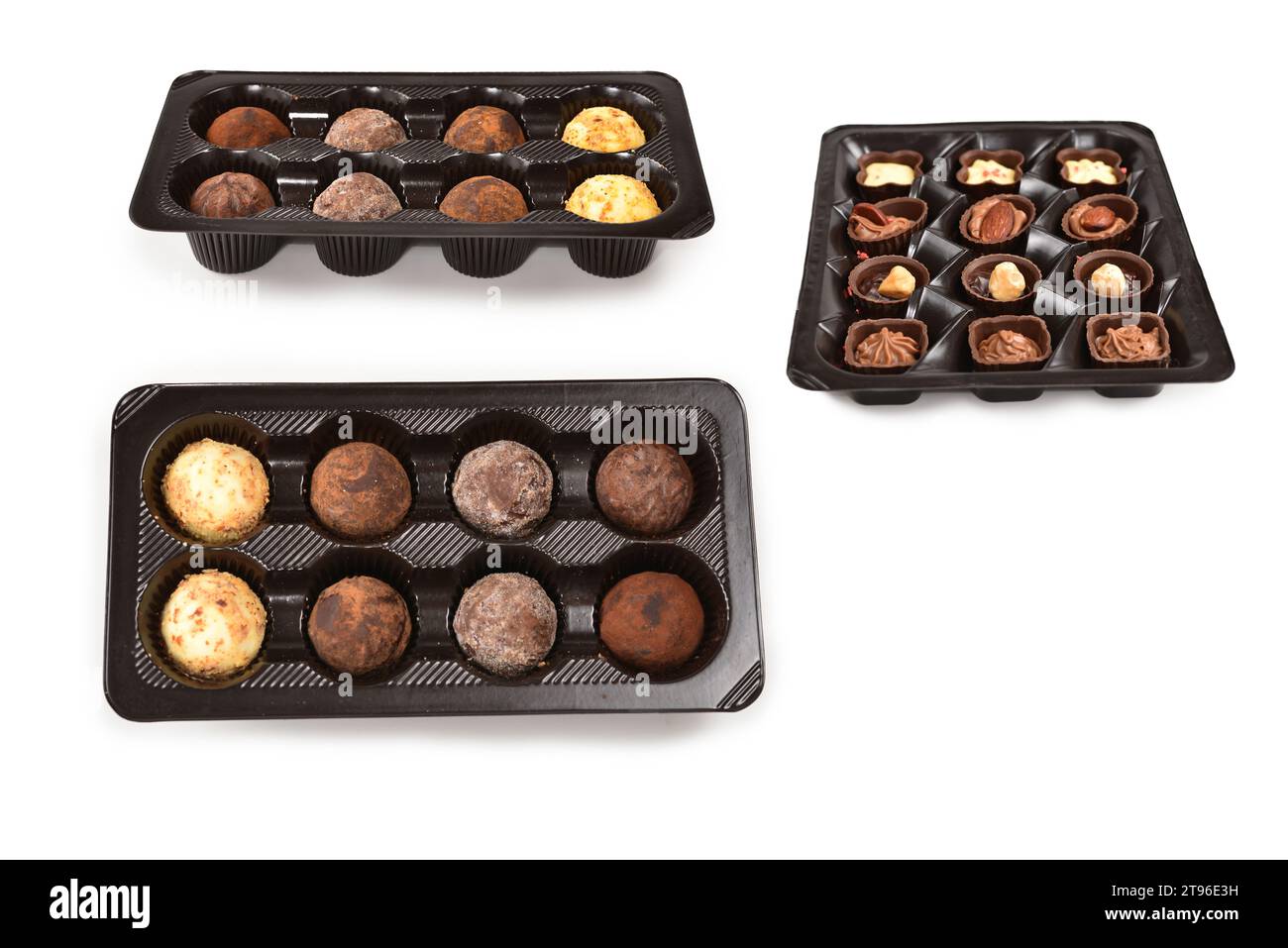 Chocolate candy collection in plastic box Stock Photo - Alamy