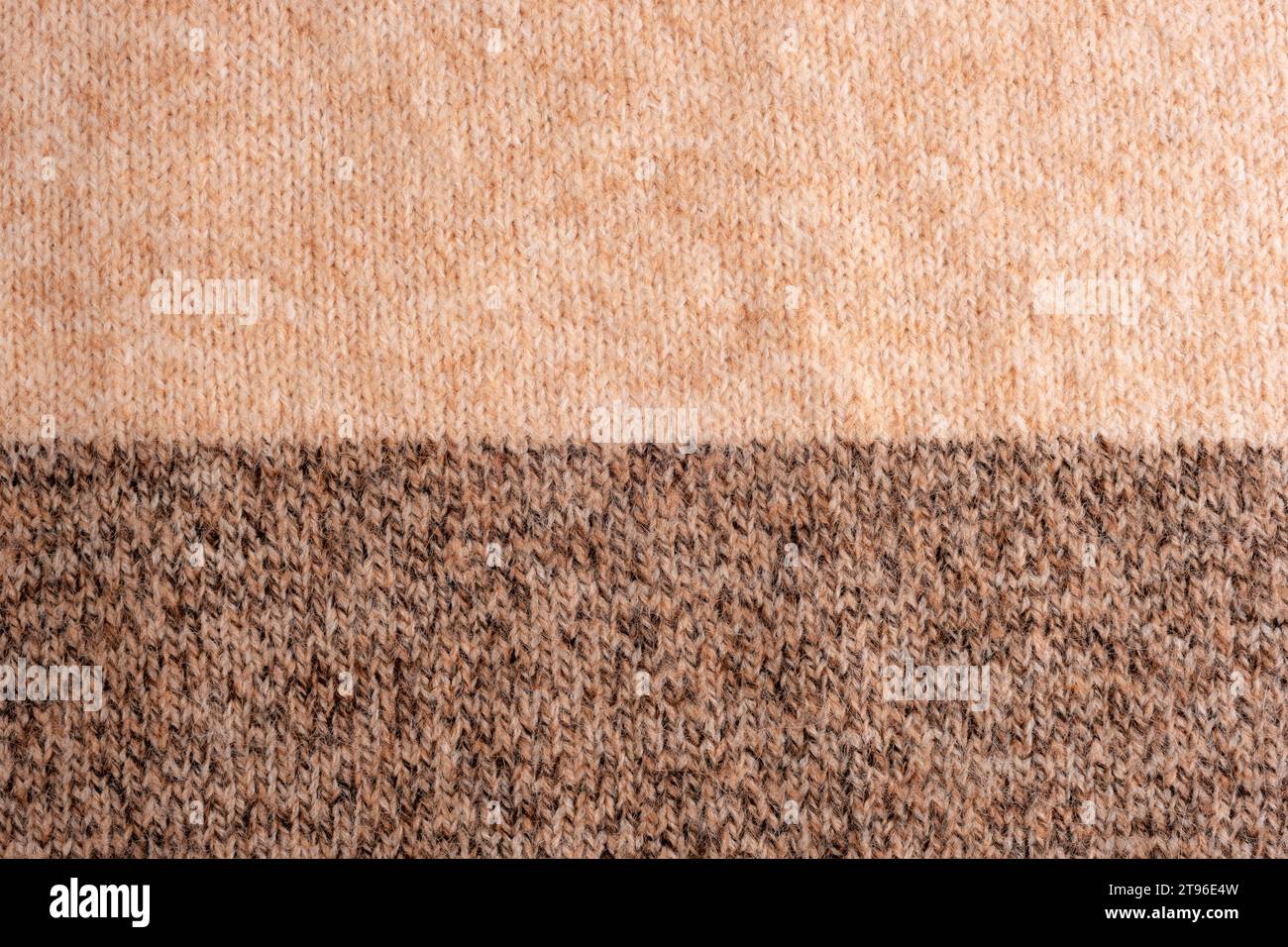 Beige and brown woolen knitted sweater fabric, texture, background ...