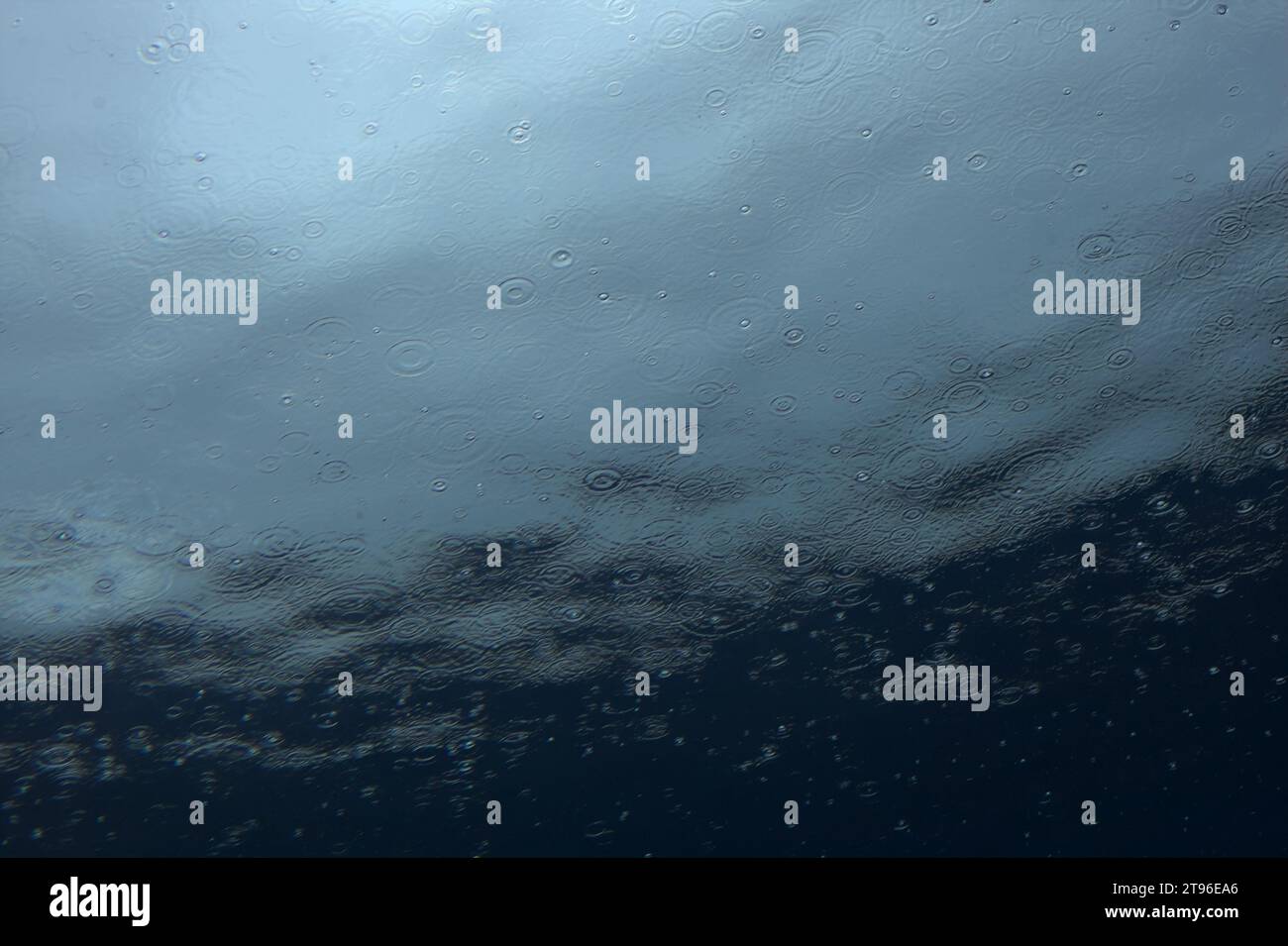 Rain on the water seen from below the surface Stock Photo - Alamy