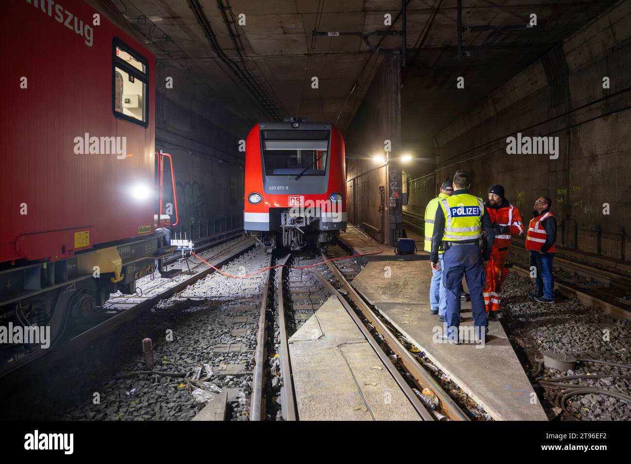 Munich, Germany. 23rd Nov, 2023. Federal police officers and railroad workers stand by a ...