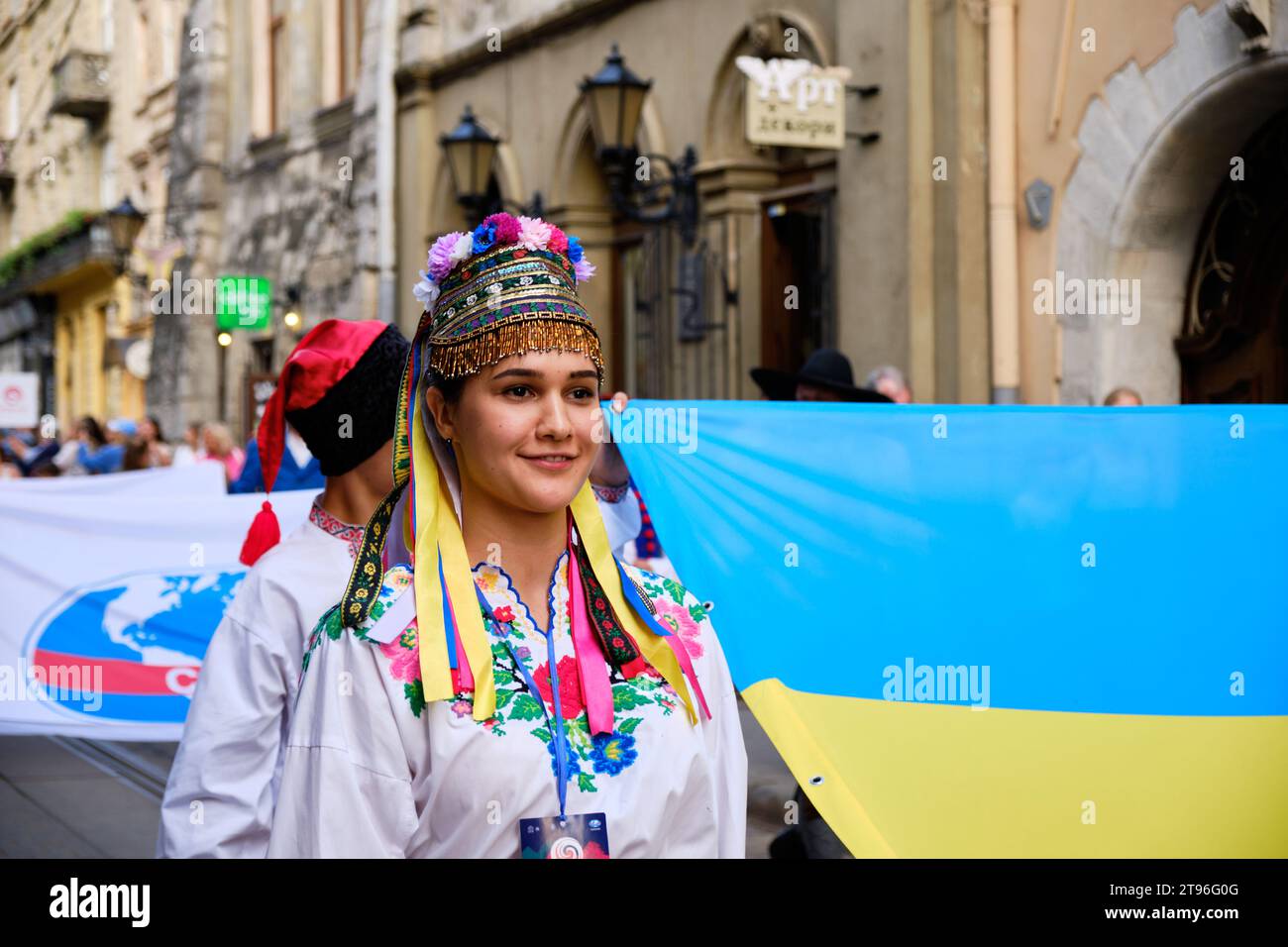Portrait of Ukrainian Folklore girl local costume Flag bearer during of ...