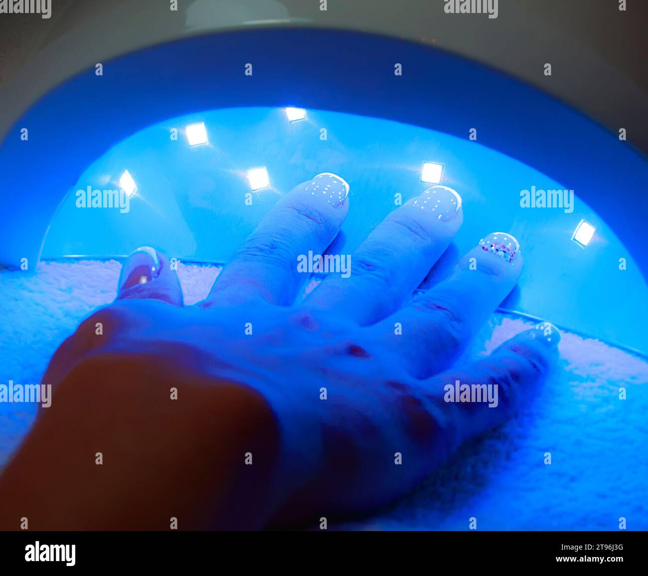 The Drying in Nail enamel drying device. Selective focus Stock Photo ...