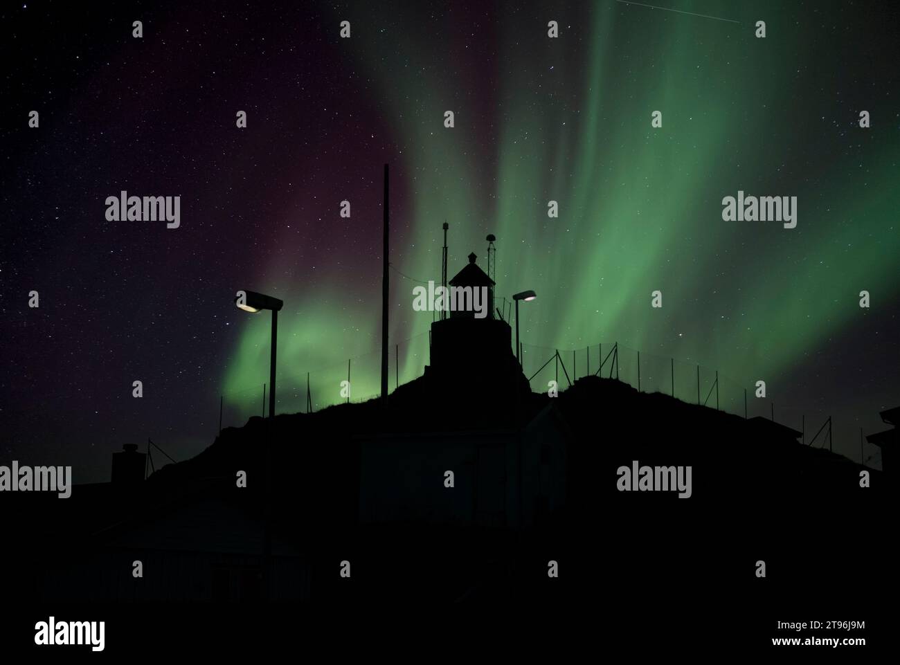 Northern Lights display at Honningsvag lighthouse, Northern Norway ...