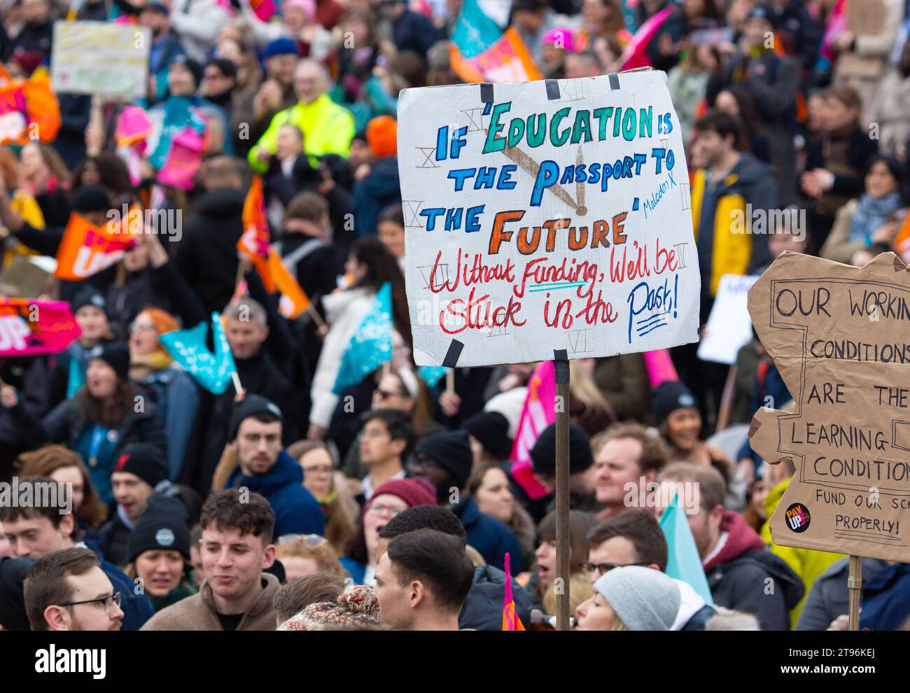 Placards are held during a march and rally called by the NEU (National ...